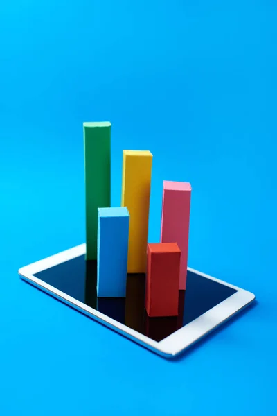 Tablet with baar chart Stock Photo by ©sata.creative.gmail.com 166532808