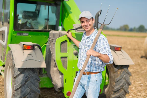 Farmer with pitchfork Stock Photos, Royalty Free Farmer with pitchfork ...
