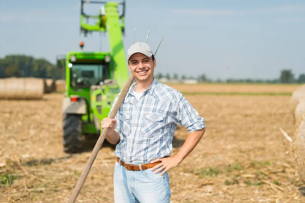 Farmer with pitchfork Stock Photos, Royalty Free Farmer with pitchfork ...
