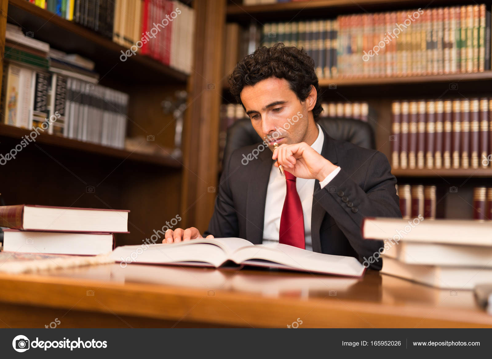 Someone Reading A Lot Of Book