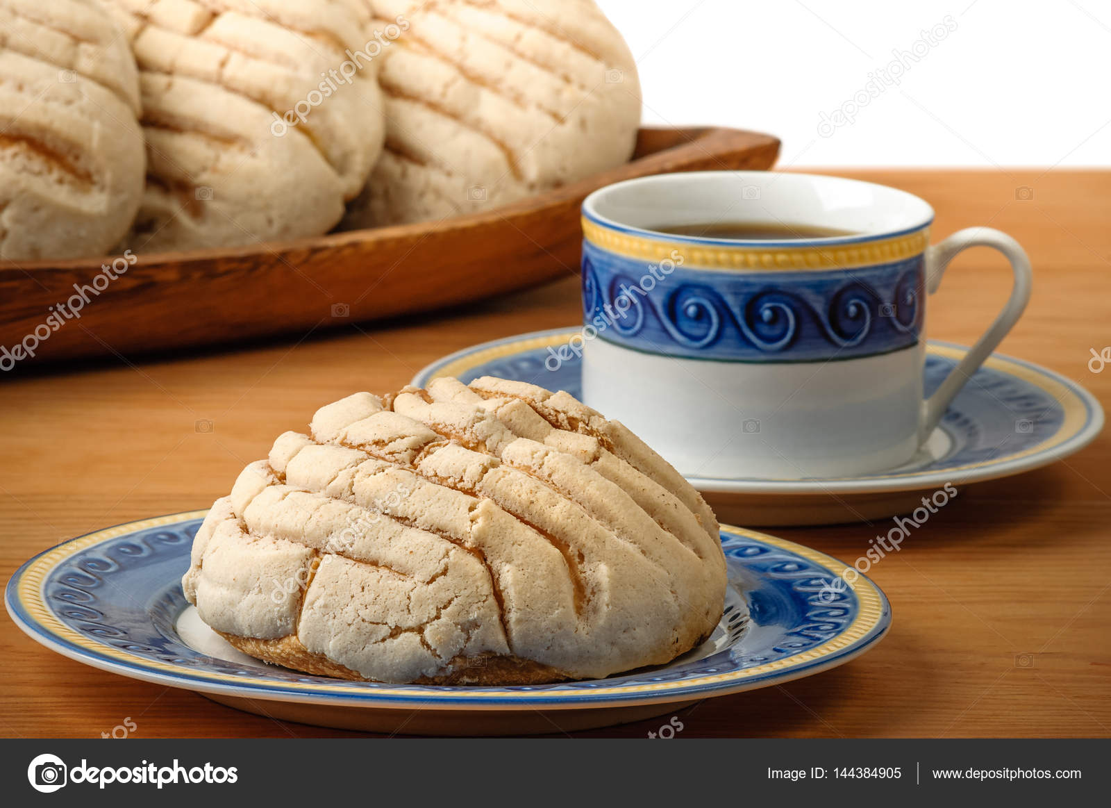 Mexican Conchas sweet bread with coffee cup — Stock Photo © agcuesta1 ...