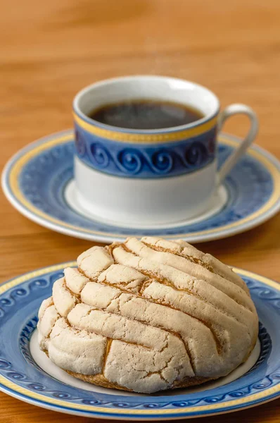 Mexican Concha sweet bread with coffee cup Stock Photo by ©agcuesta1 ...