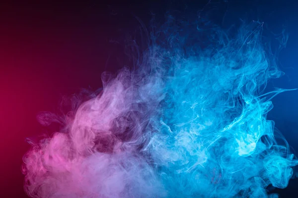 pink cloud of smoke of black isolated background. Background from the ...