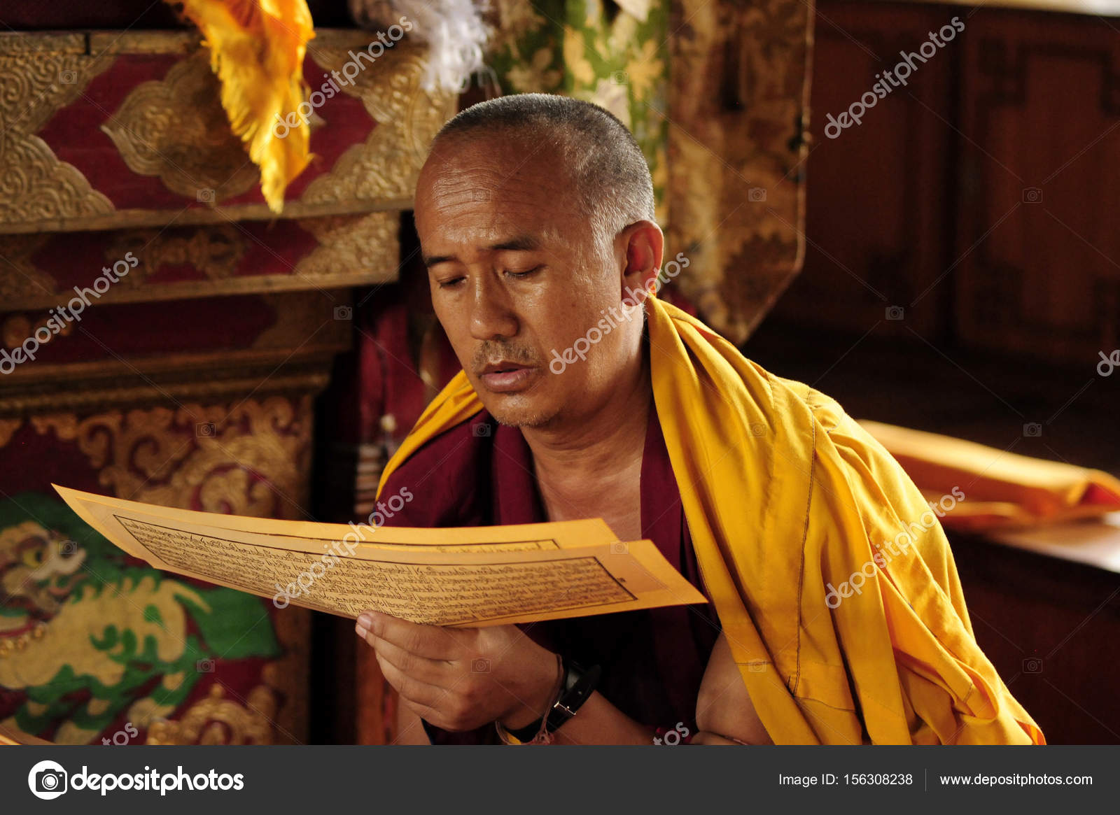 Buddhist teacher reading – Stock Editorial Photo © teotarras #156308238