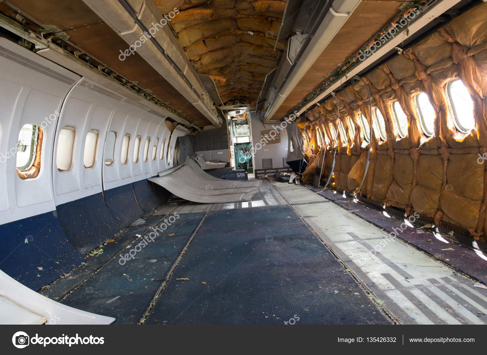 Inside airplane wreckage fuselage Stock Photo by ©sasilsolution 135426332