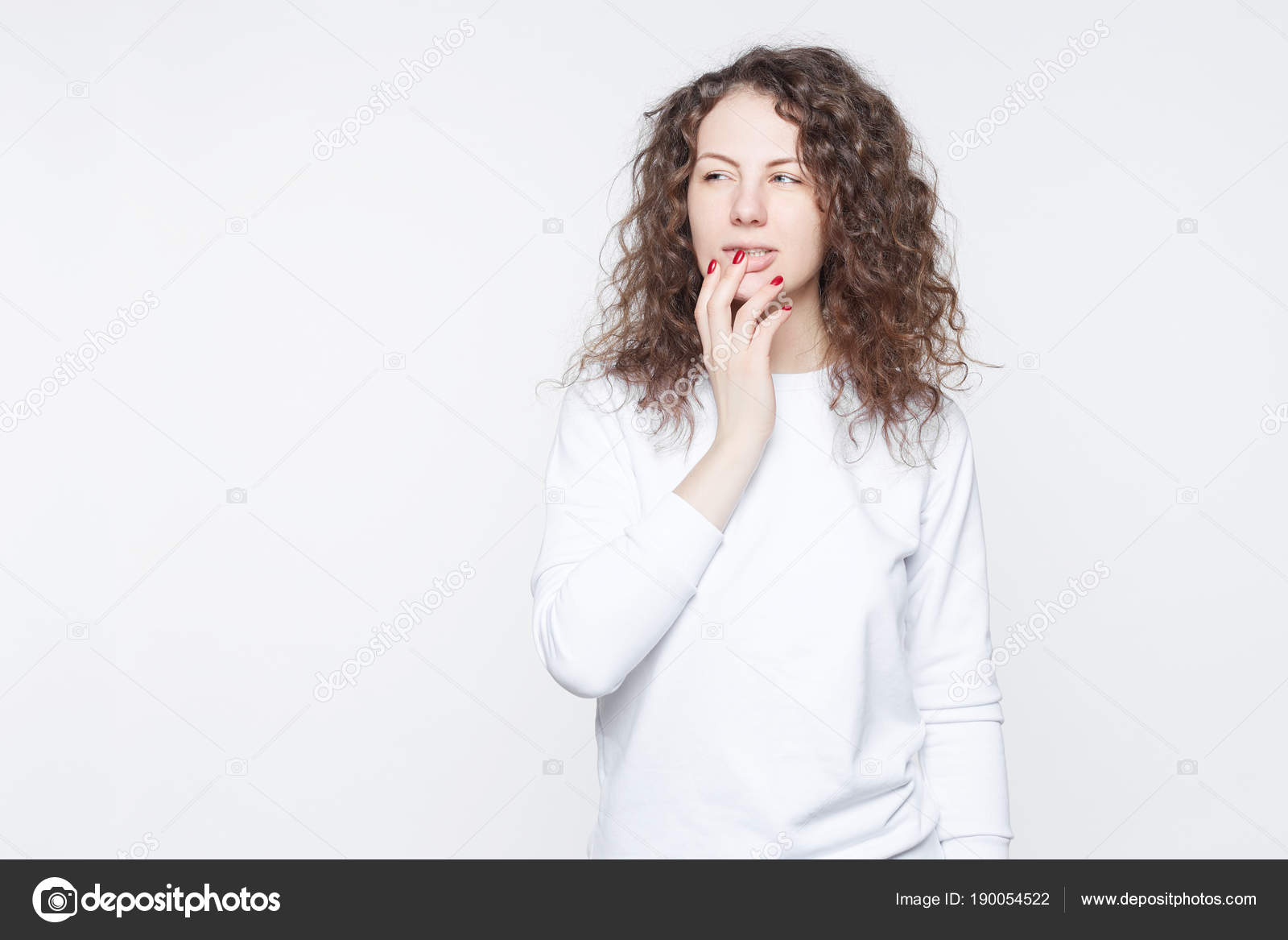 Young Caucasian Attractive Female Skeptic Look Raises Eyebrow ...