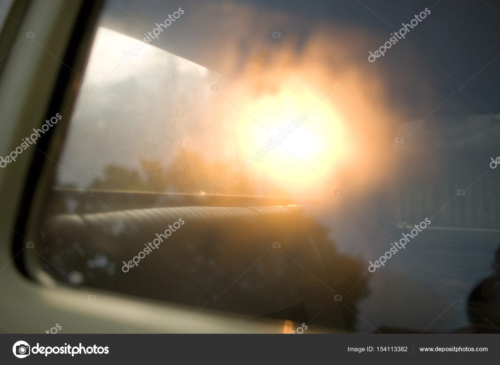Sunlight reflecting on car window — Stock Photo © ImageSource #154113382