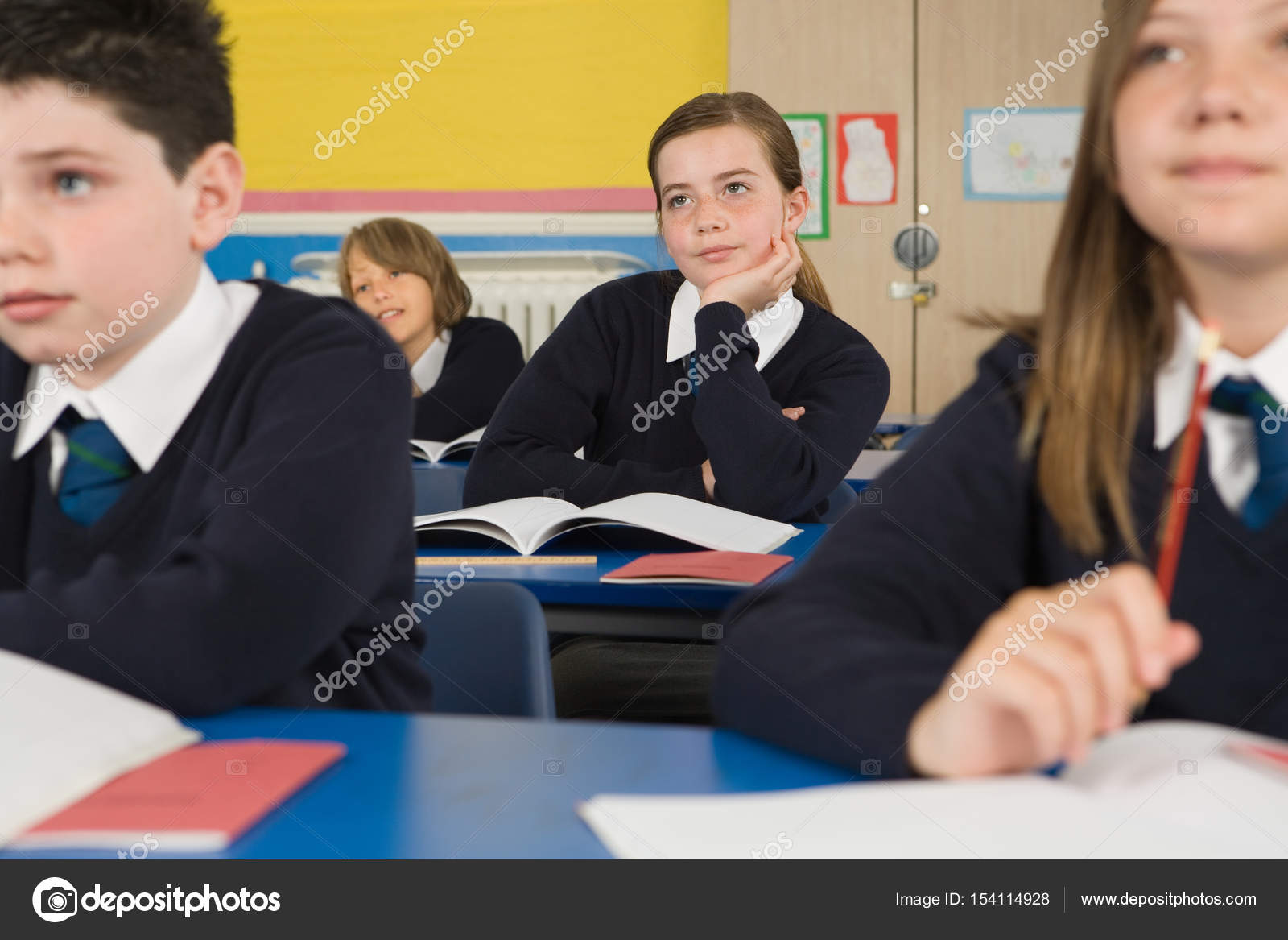 Students in class, close-up — Stock Photo © ImageSource #154114928