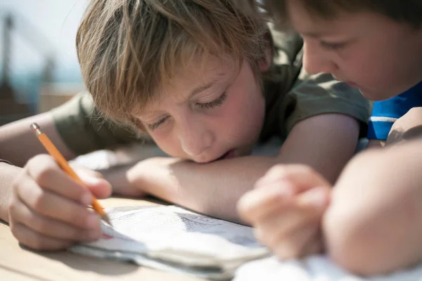 Little girl writing homework — Stock Photo © AlexLipa #161647474