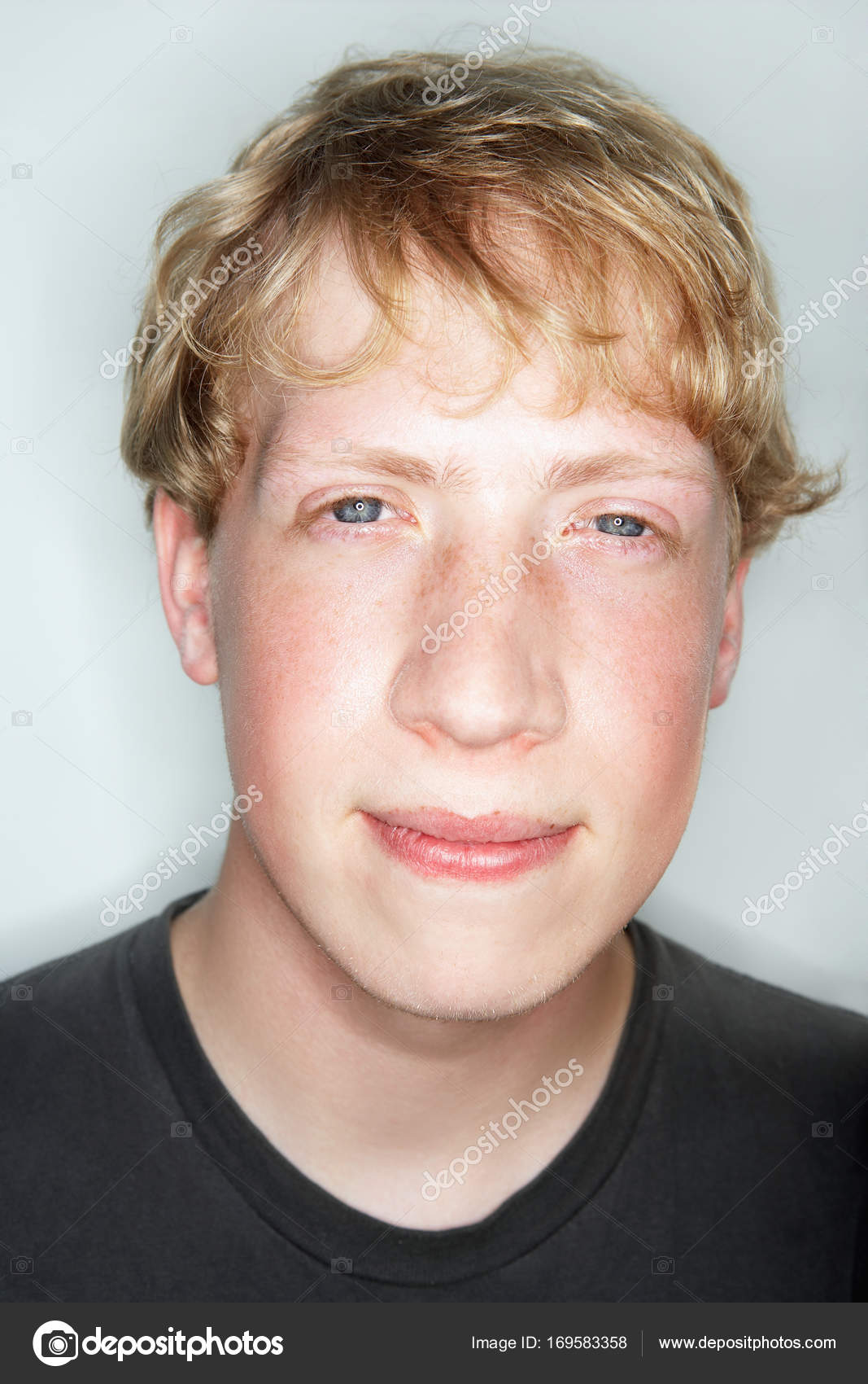 Young Male Smiling Looking Camera — Stock Photo © ImageSource #169583358