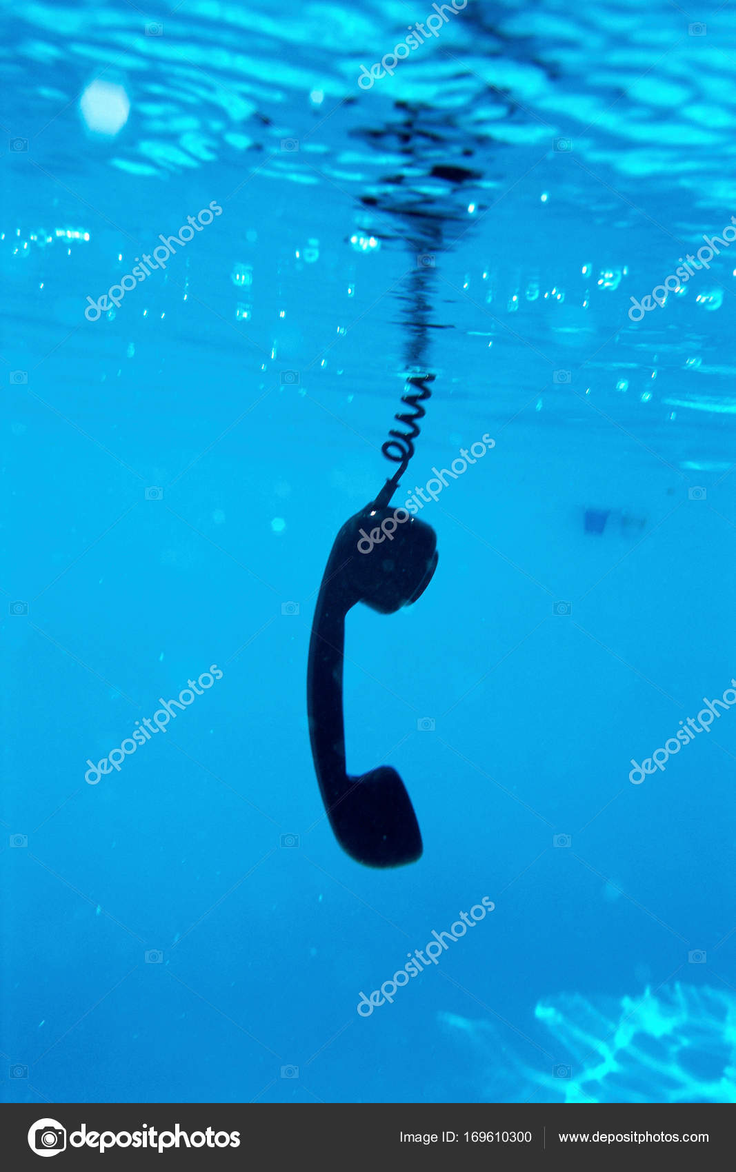 Telephone Receiver Swimming Pool — Stock Photo © ImageSource #169610300