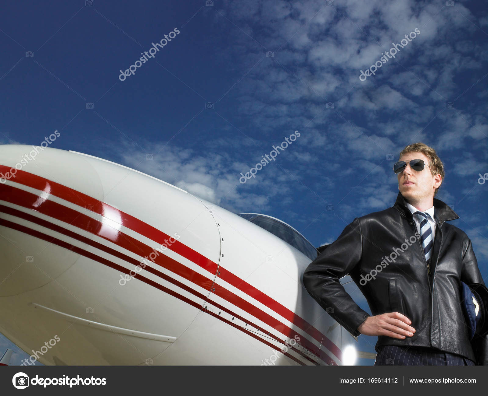 Pilot Standing Next Private Jet – Stock Editorial Photo © ImageSource ...