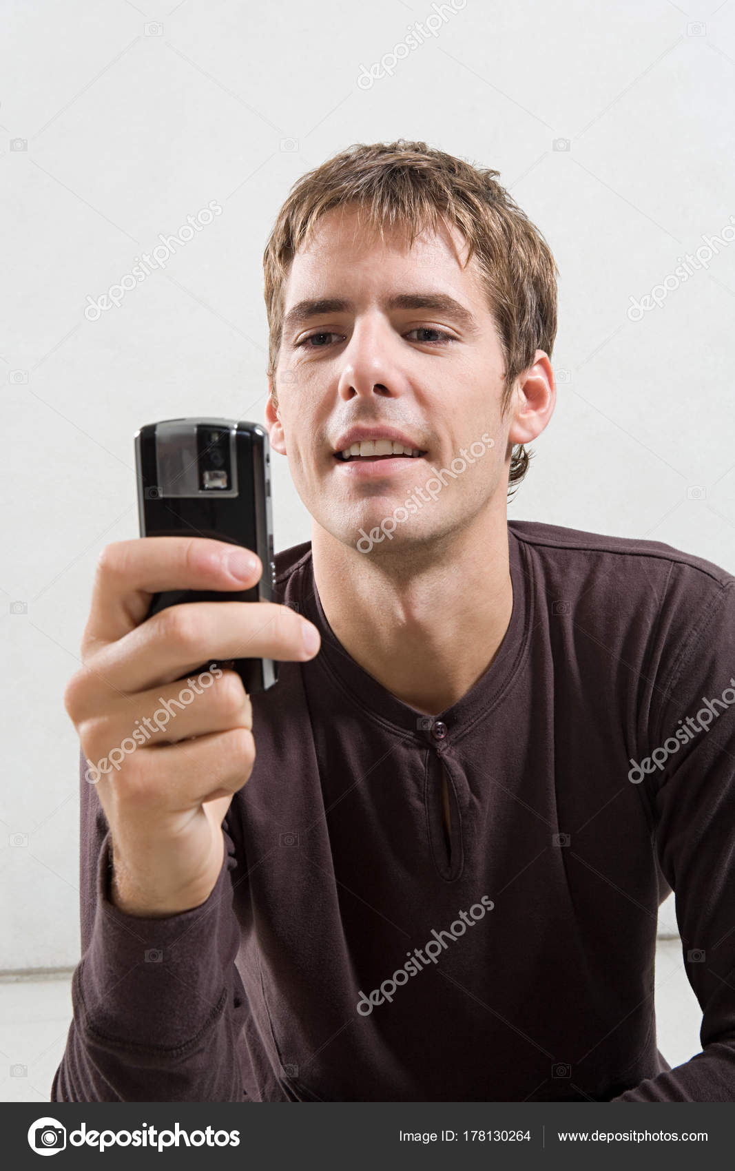 Man Using Cell Phone — Stock Photo © ImageSource #178130264