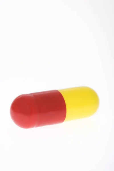 Red yellow capsule pill Stock Photos, Royalty Free Red yellow capsule ...