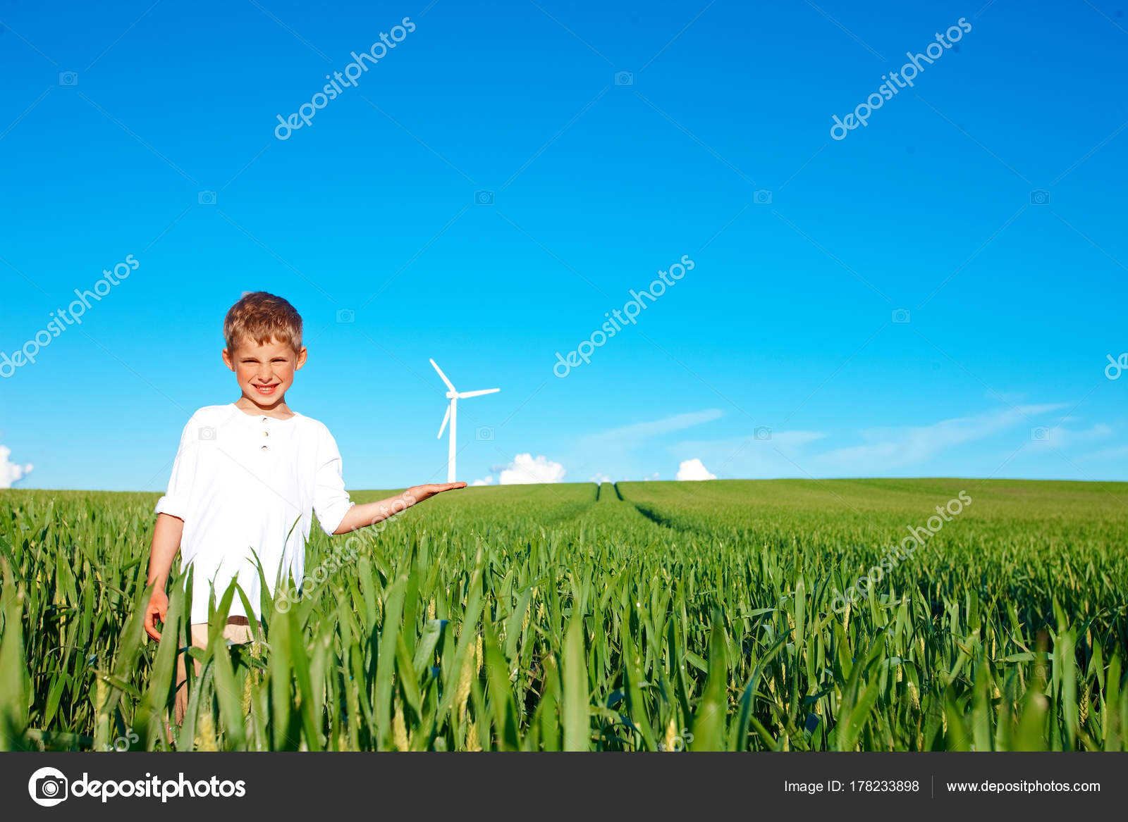 Boy Field Wind Turbine — Stock Photo © ImageSource #178233898