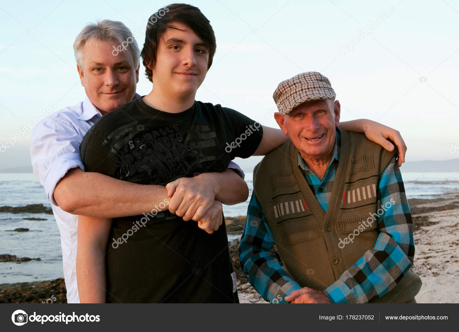 Three Generations Men Beach — Stock Photo © ImageSource #178237052