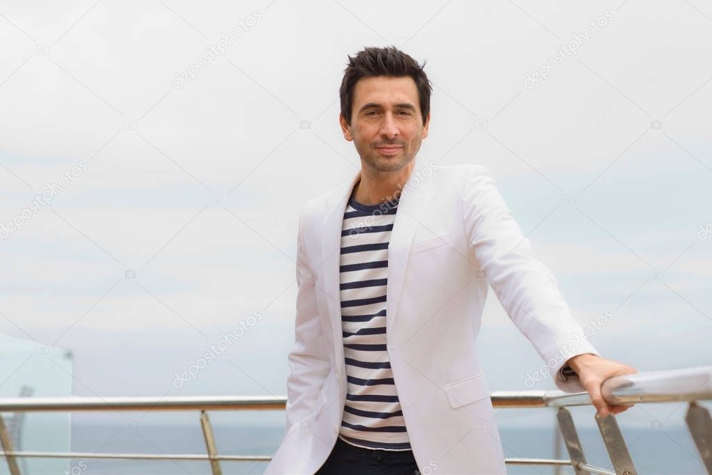 Man Standing Railing — Stock Photo © ImageSource #178238826