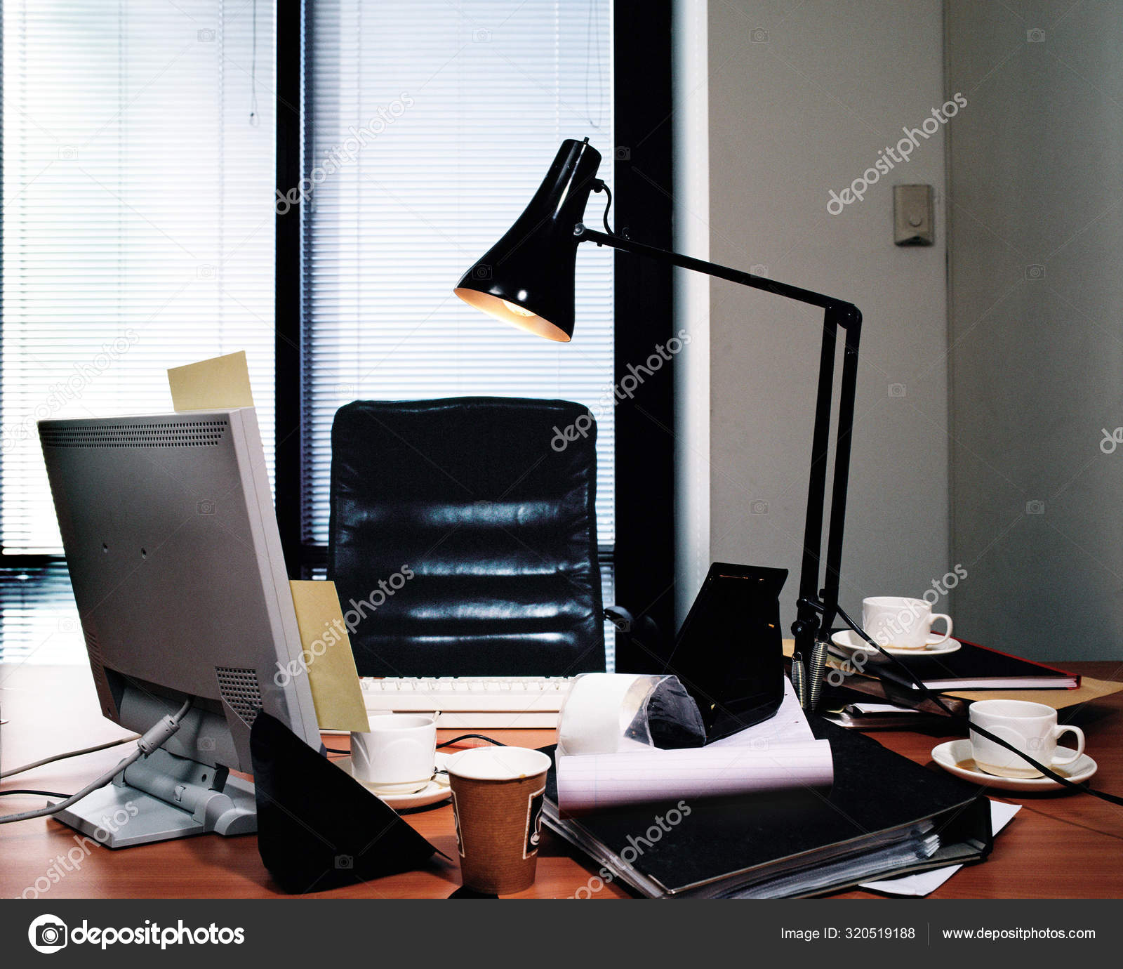 Messy Desk Computer Stock Photo by ©ImageSource 320519188