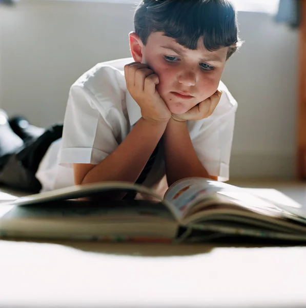 Kid reading newspaper Stock Photos, Royalty Free Kid reading newspaper ...