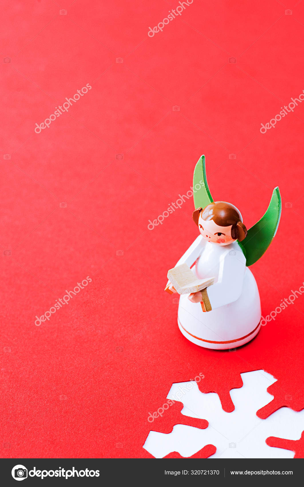 Angel Figurine Isolated Red Background Stock Photo by ©ImageSource ...
