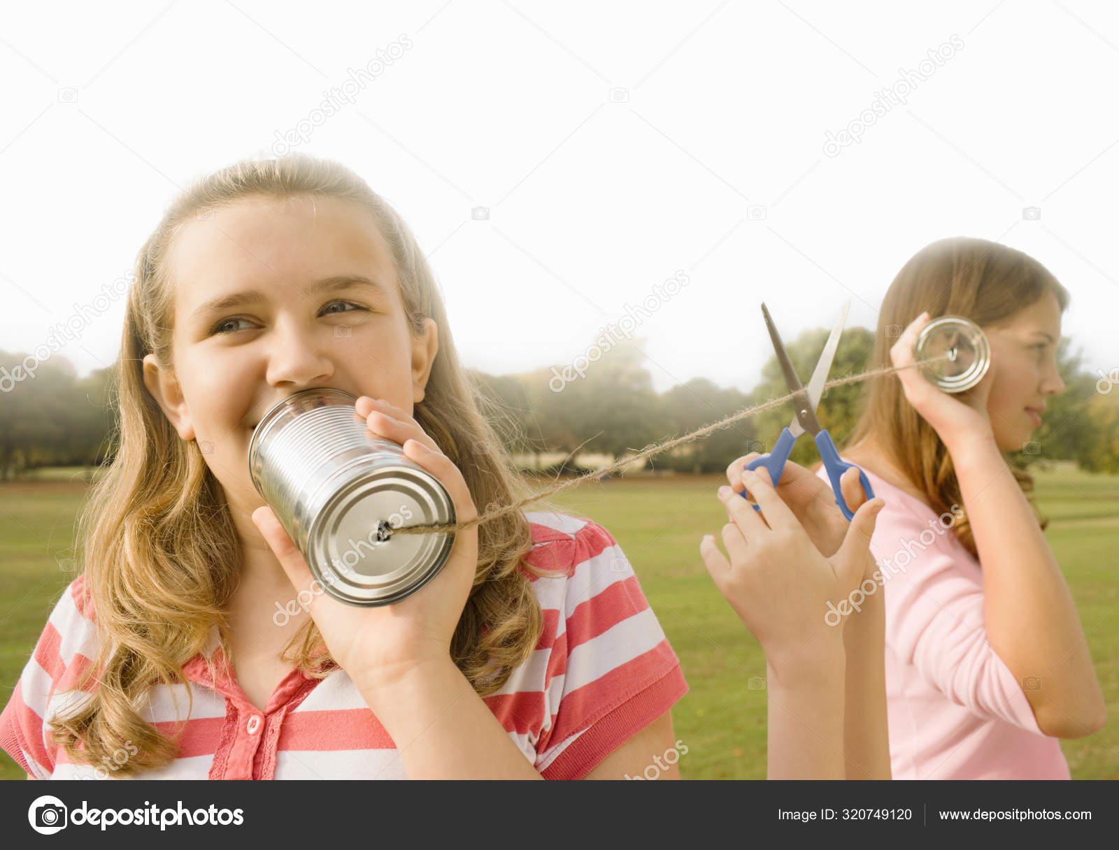 Kids Tin Can Phones Stock Photo by ©ImageSource 320749120