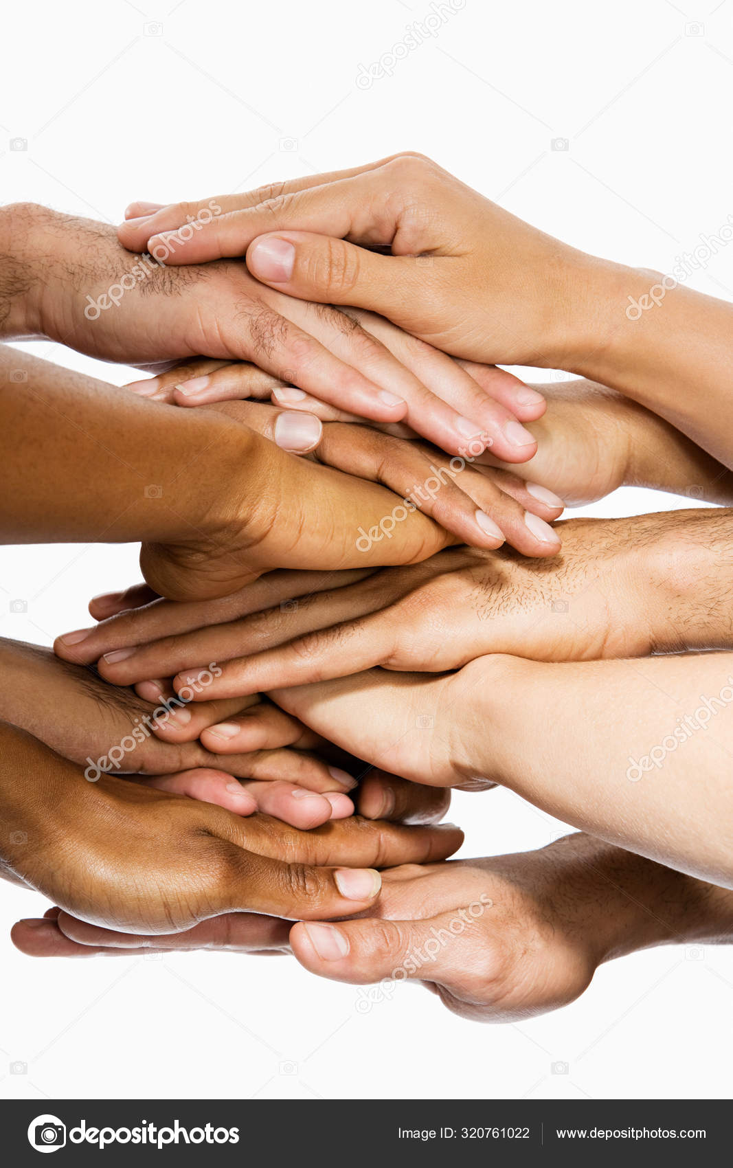 Hands Top Each Other Stock Photo by ©ImageSource 320761022