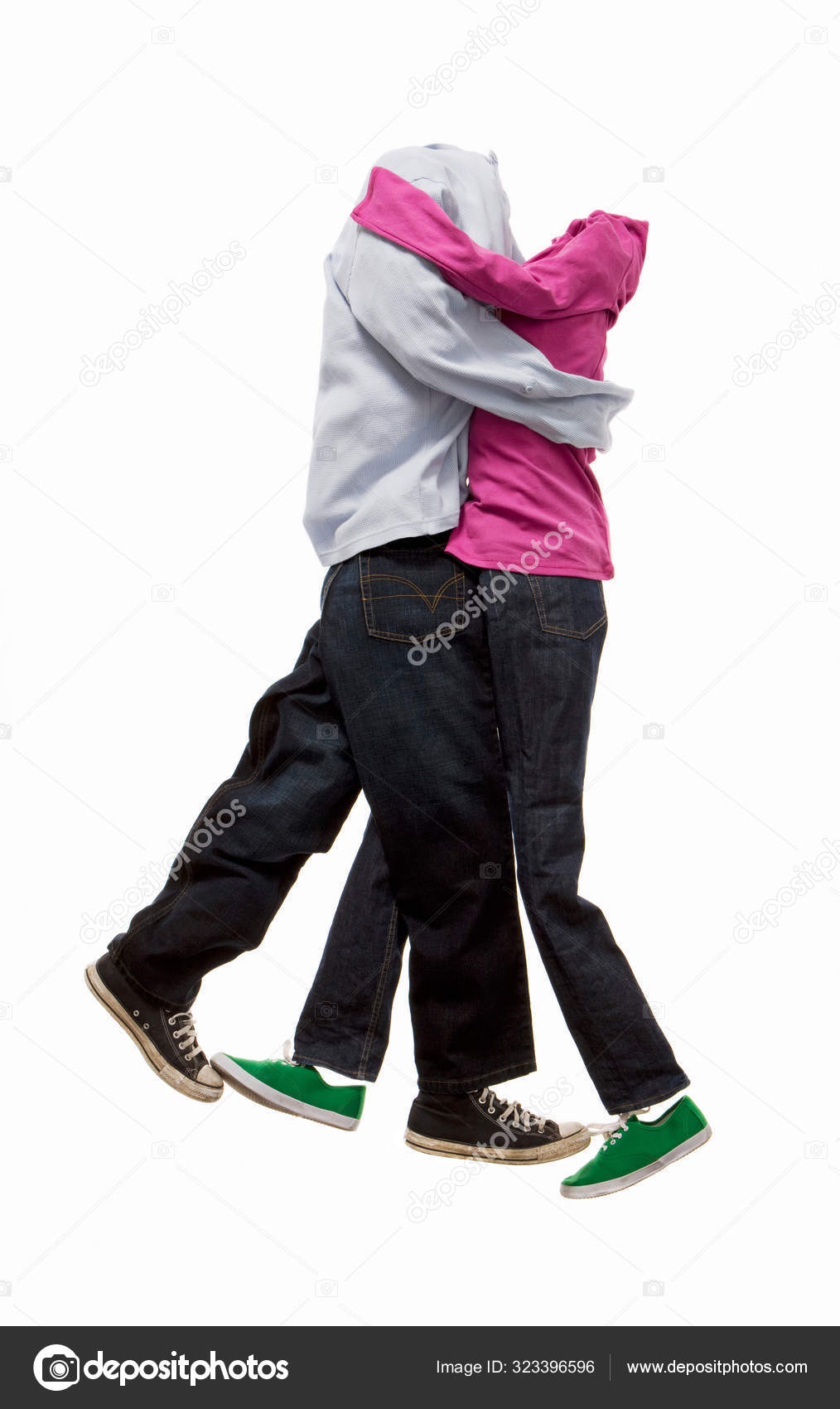 Couples' Clothes Hugging — Stock Photo © ImageSource #323396596