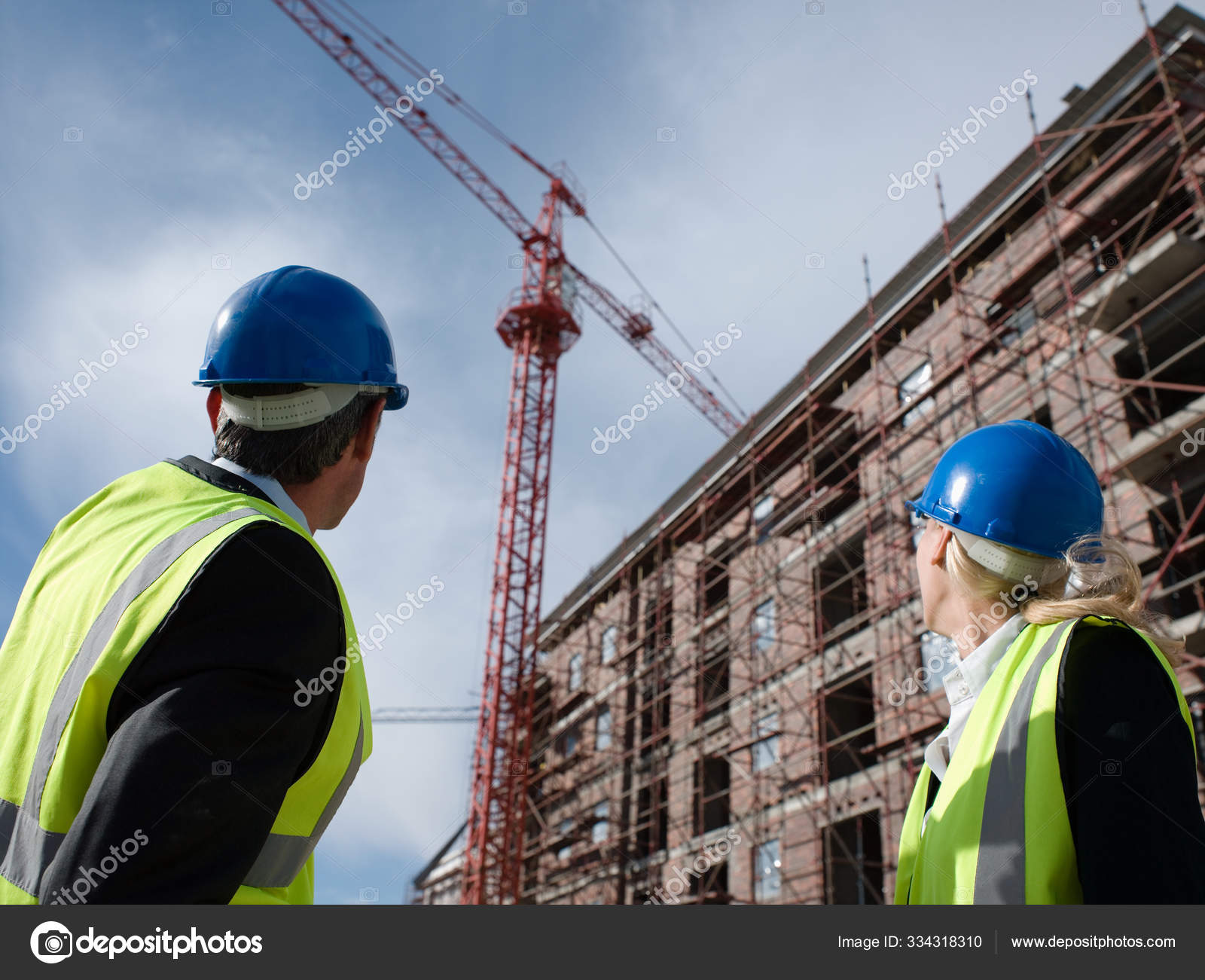 Engineers Looking Crane Stock Photo by ©ImageSource 334318310