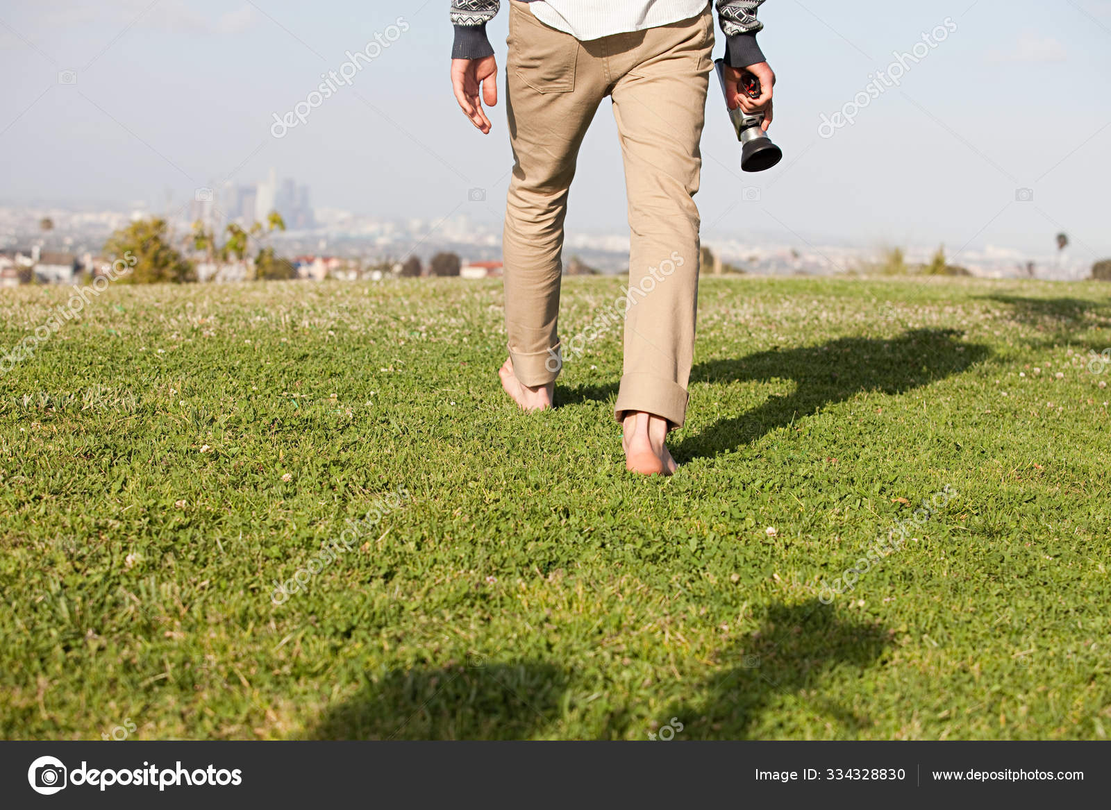 Man Walking Field Video Camera Stock Photo by ©ImageSource 334328830 Man Walking Field Video Camera Stock Photo by ©ImageSource 334328830