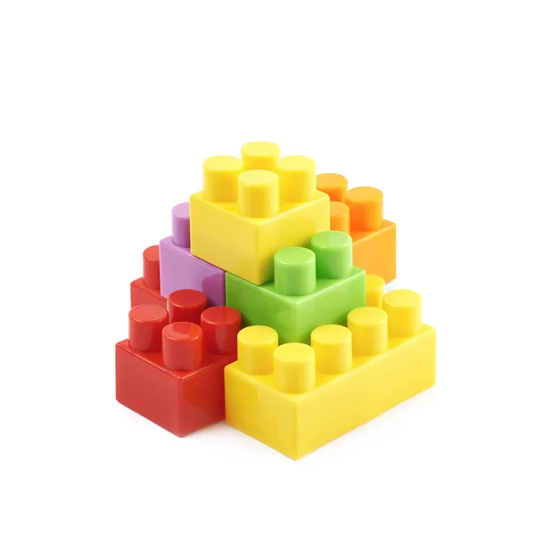 Colored toy bricks on white background Stock Photo by ©3d_kot 9430495