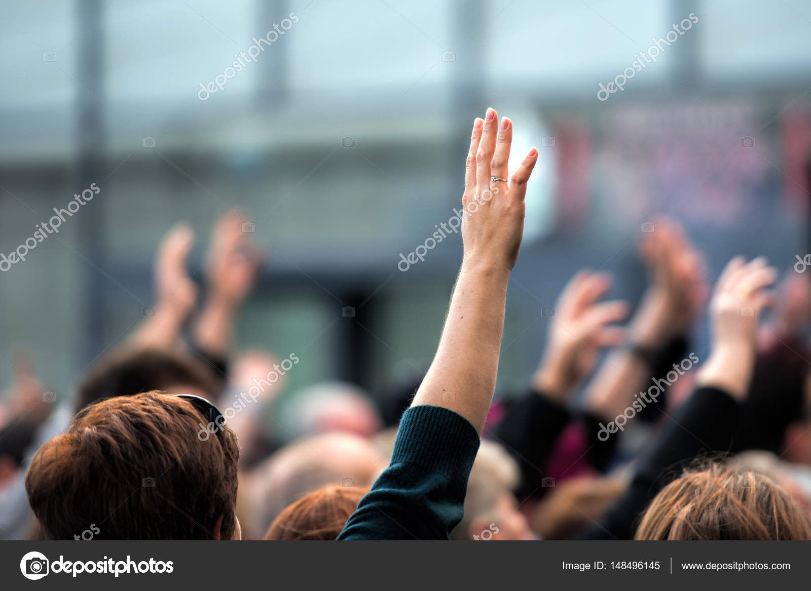 Crowd of people raises hand — Stock Photo © njaj #148496145