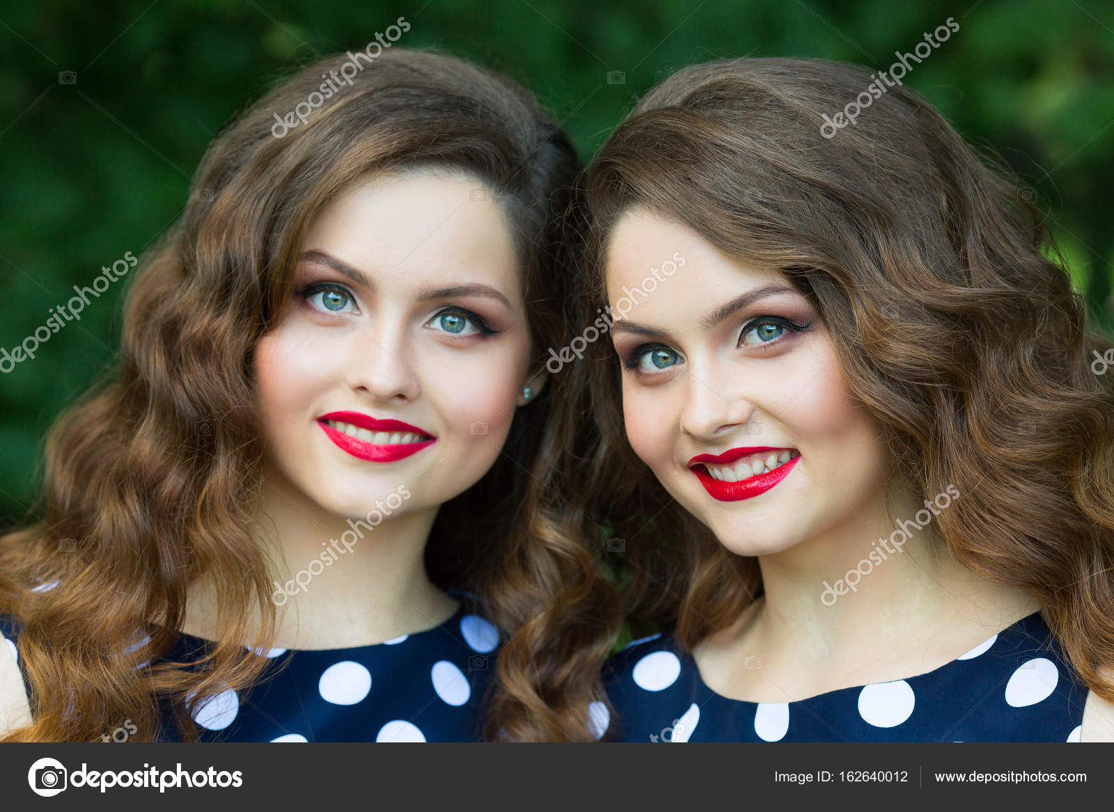 Two beautiful smiling girl Stock Photo by ©Zoom01 162640012