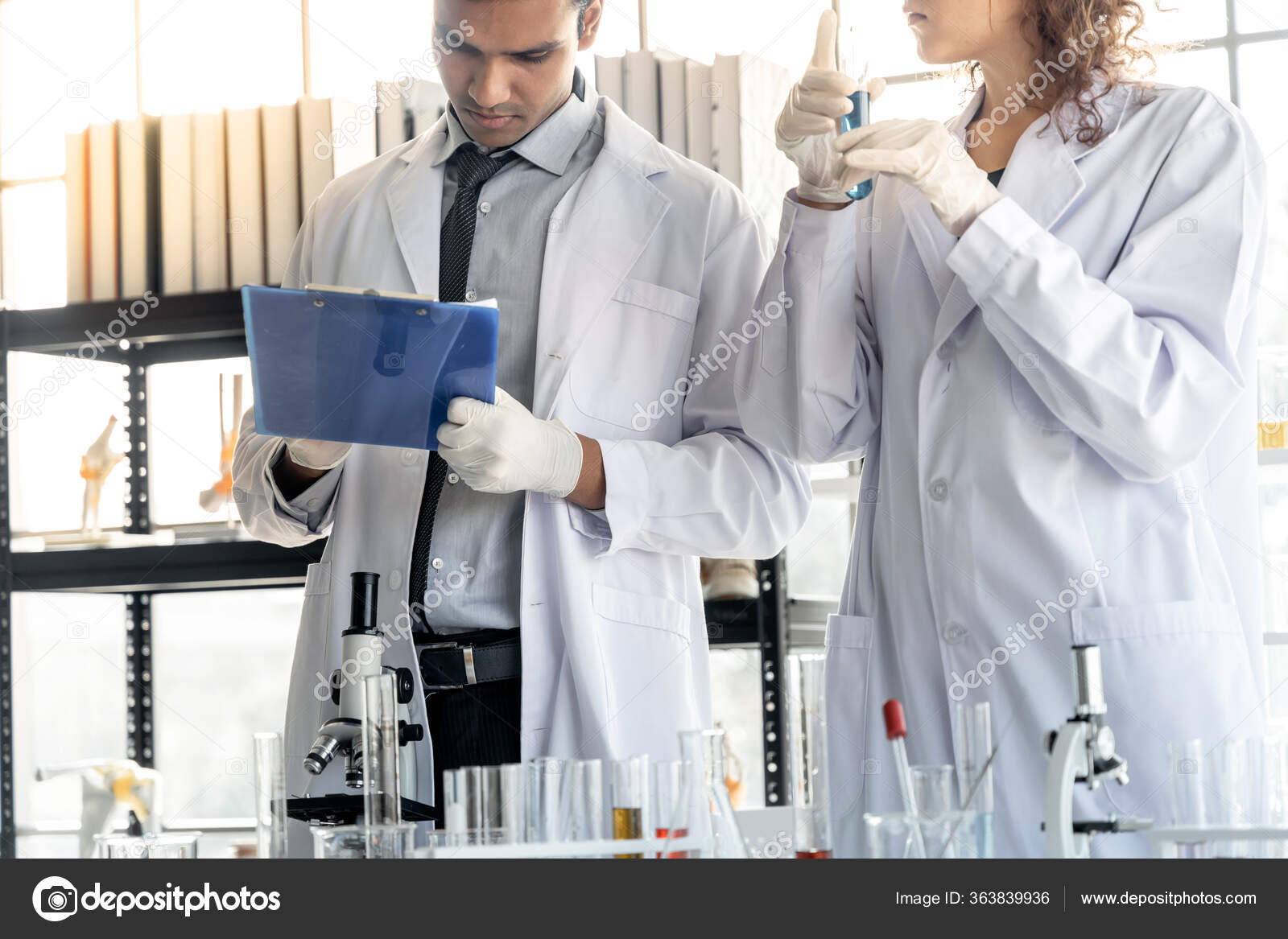 Two Scientists Working Together Chemical Laboratory — Stock Photo © tuaindeed #363839936
