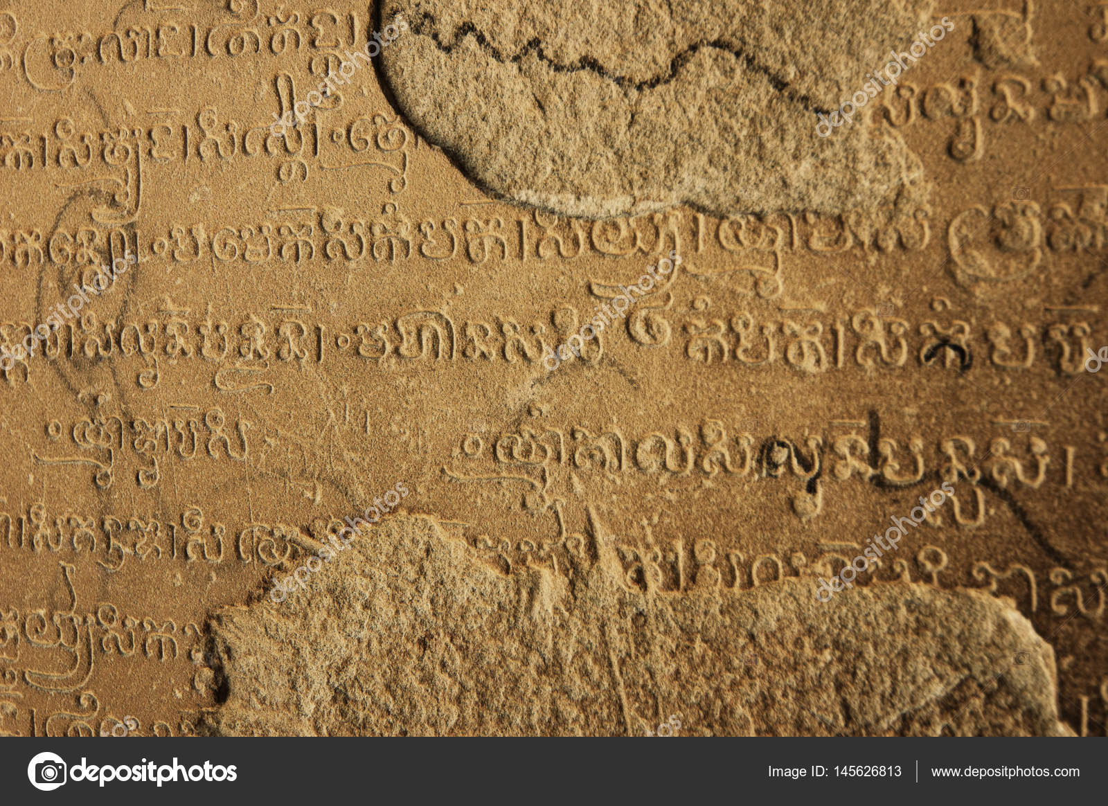 Old Khmer Language on Angkor wall — Stock Photo © nozyer #145626813