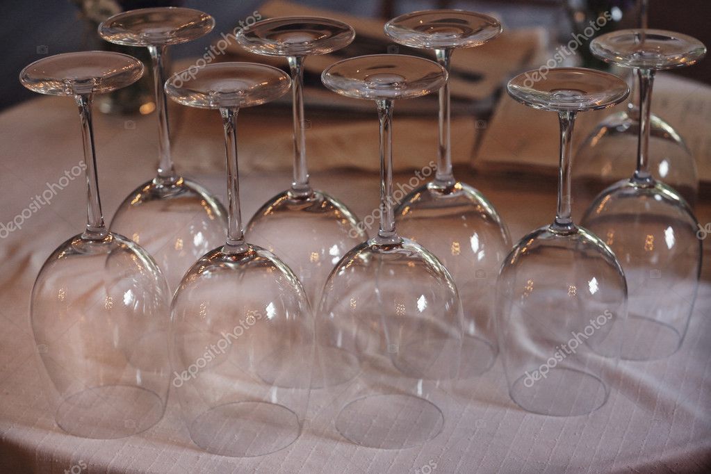 Glasses on a table in restaurant — Stock Photo © belchonock #126335142