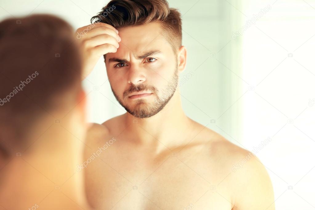 Handsome unshaven man — Stock Photo © belchonock #126335334