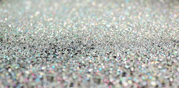 Glittering silver sparkles textured background - Stock Image - Everypixel