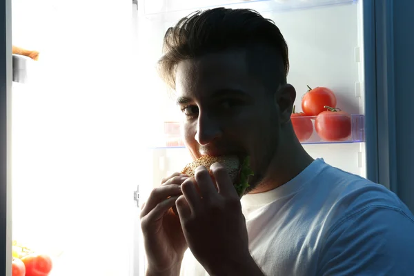 Man eating fridge Stock Photos, Royalty Free Man eating fridge Images ...