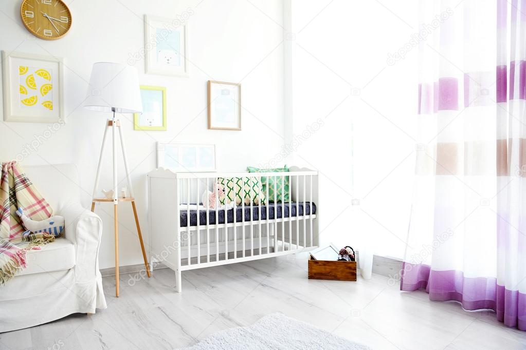 Interior of modern baby room — Stock Photo © belchonock #128023504