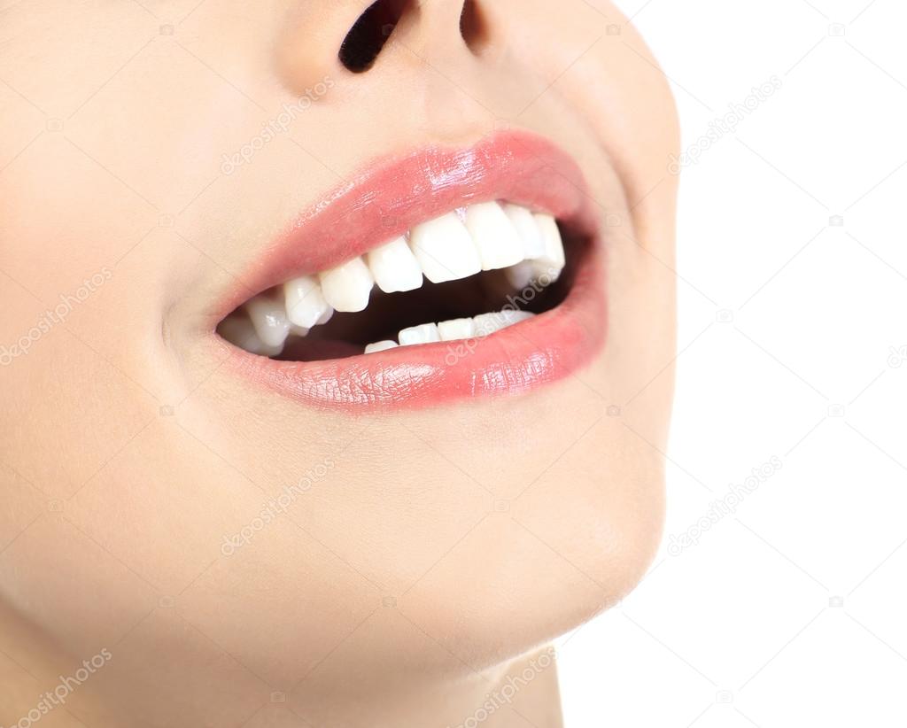 Beautiful smile with healthy teeth Stock Photo by ©belchonock 128255354