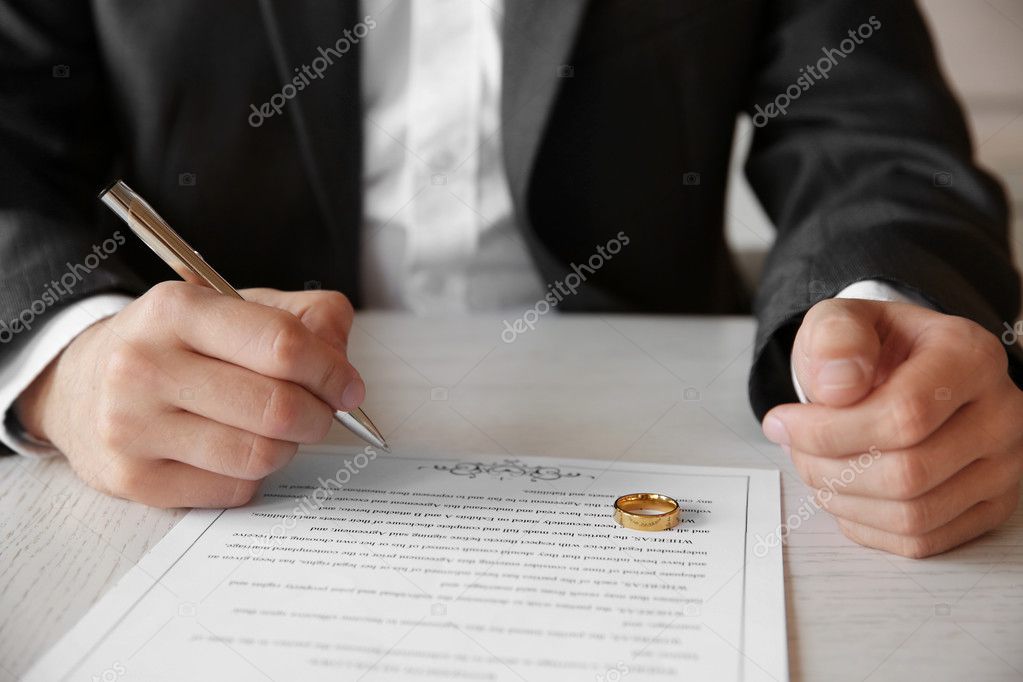 Signing marriage contract — Stock Photo © belchonock #128258906