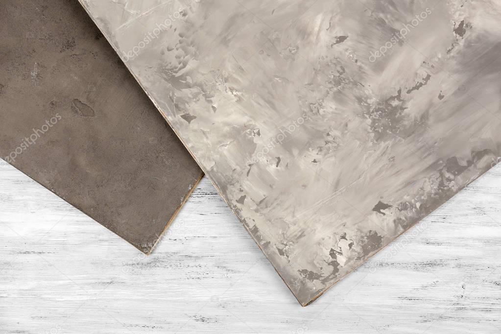 Grey textured tiles Stock Photo by ©belchonock 129379292