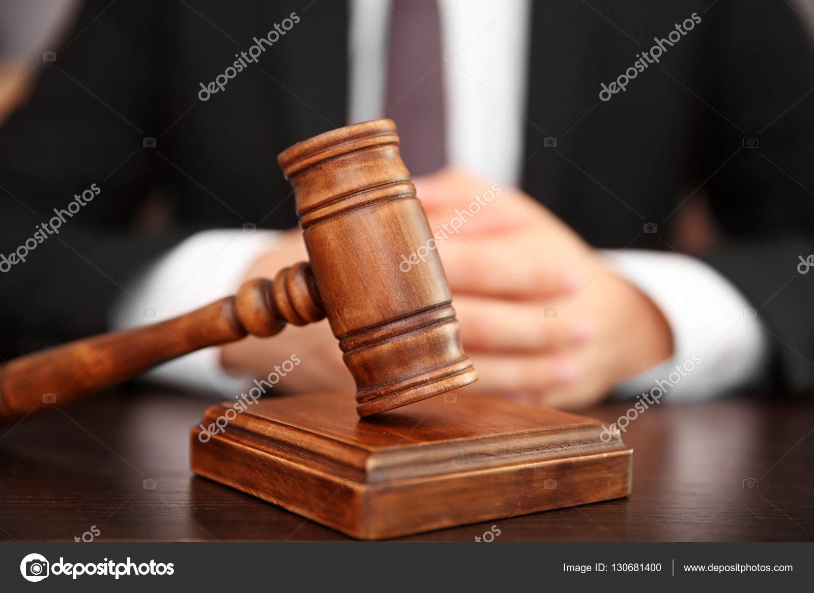 Court hammer on table Stock Photo by ©belchonock 130681400