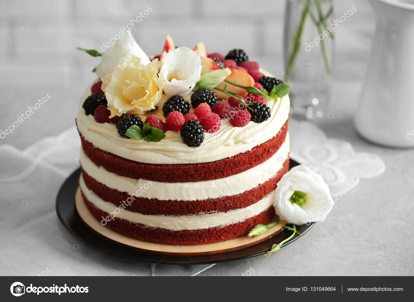 Delicious cake on table Stock Photo by ©belchonock 131049664