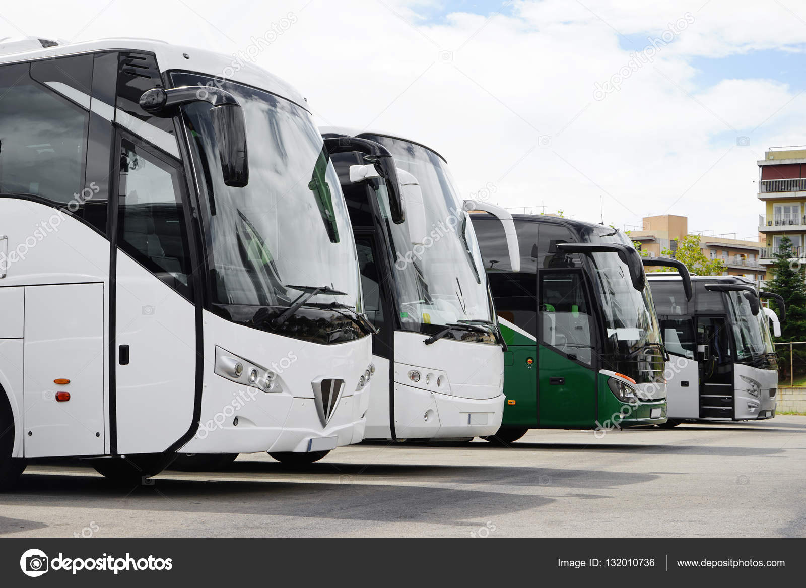 Big tourists buses on parking Stock Photo by ©belchonock 132010736