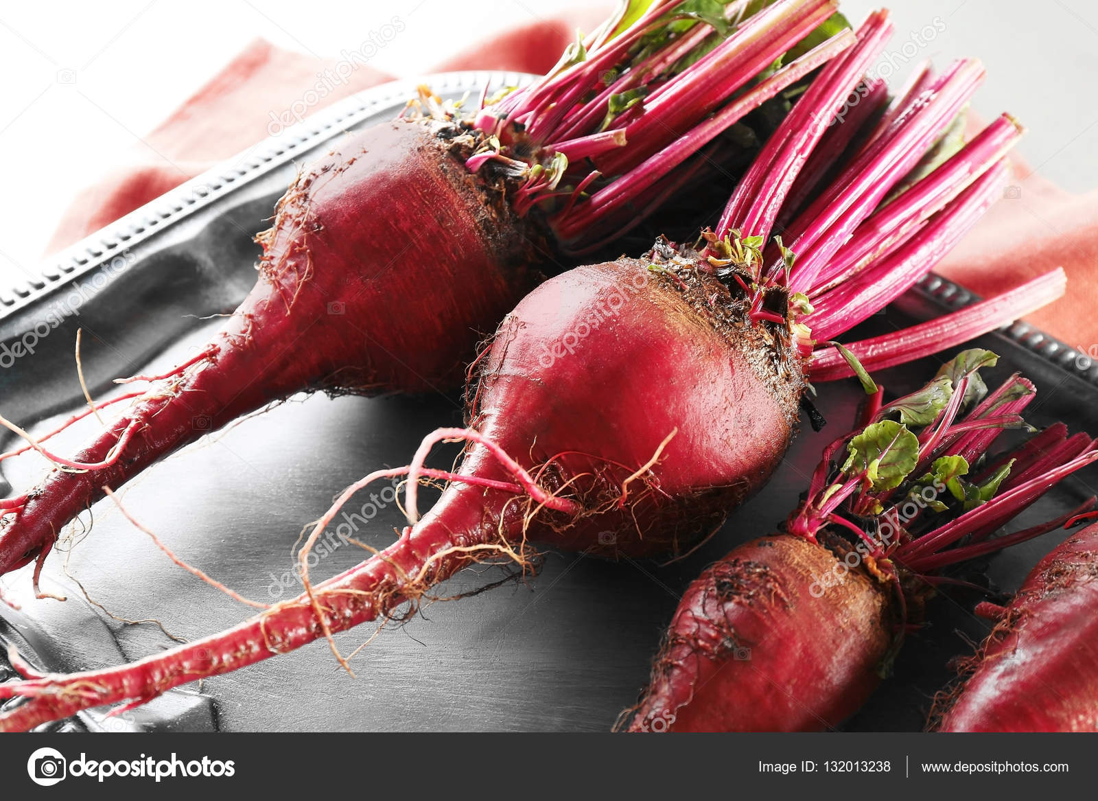 Fresh young beets on silver tray — Stock Photo © belchonock #132013238