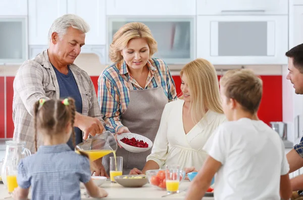 Happy large family on kitchen - Stock Image - Everypixel