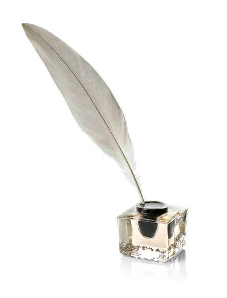 Feather pen and inkwell — Stock Photo © belchonock #133794068