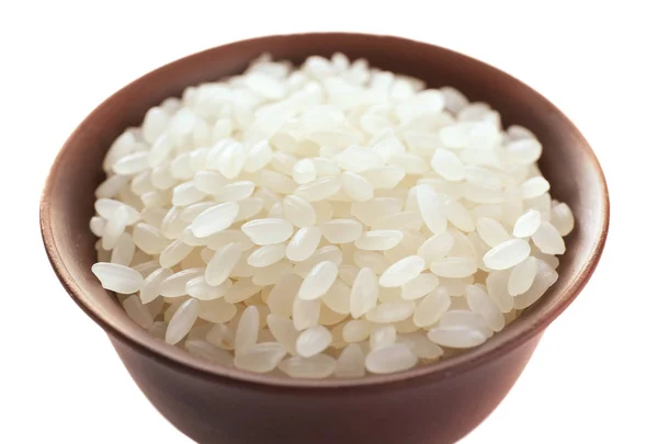 Polished long rice heap in small glass bowl, isolated on white Stock ...