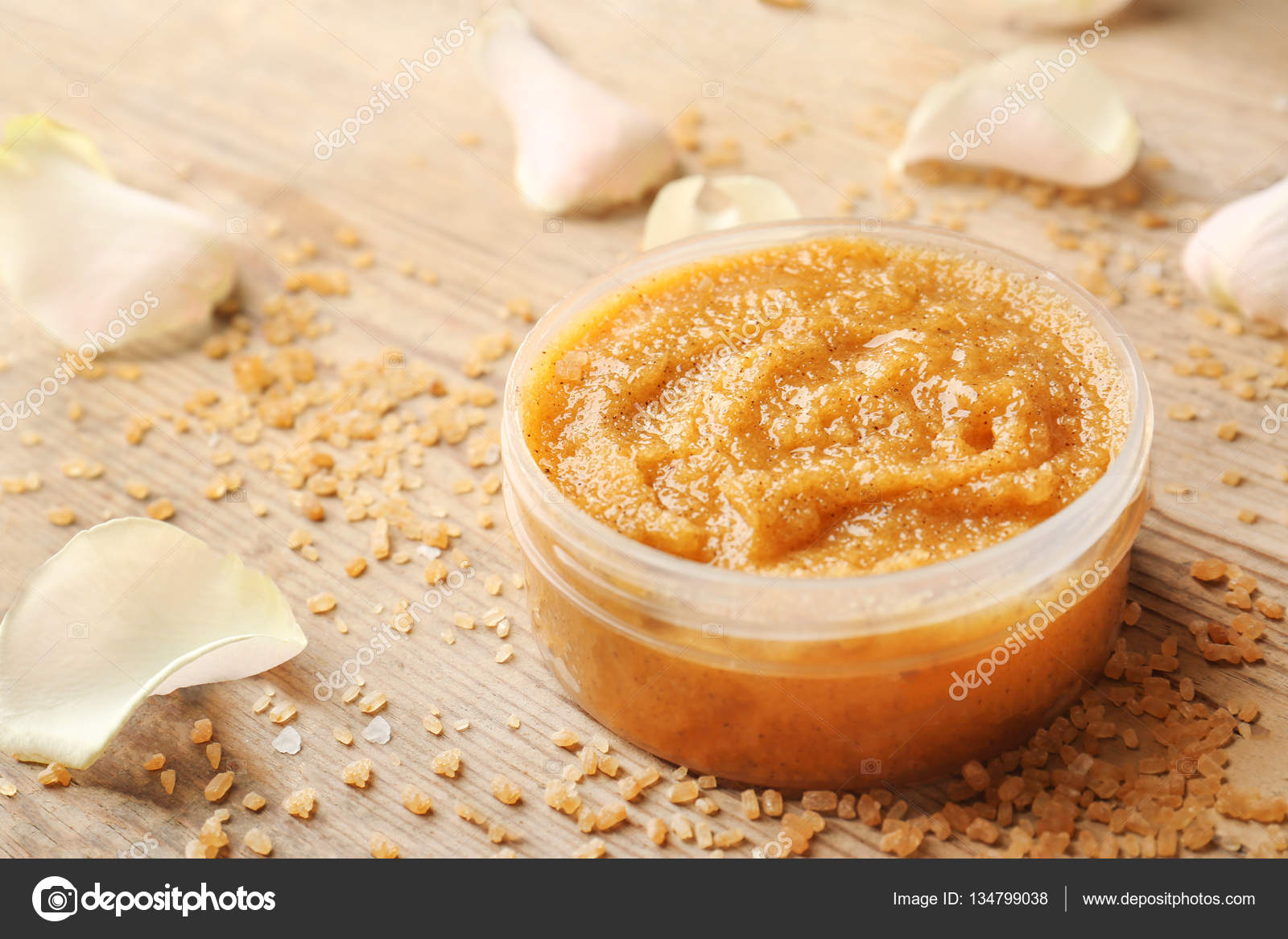 Body scrub, petals and sugar Stock Photo by ©belchonock 134799038